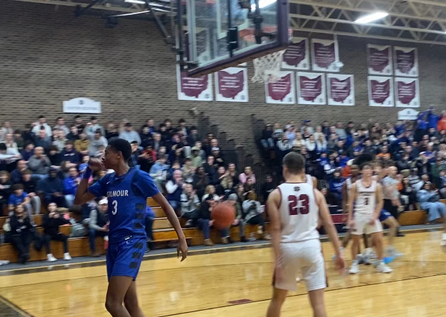 Gilmour's stellar shooting propels them to 69-49 win over rival ...